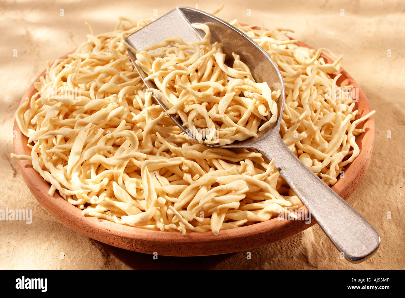 Uncooked trofie pasta hi-res stock photography and images - Alamy