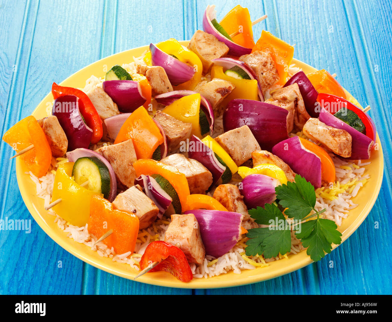 CHIICKEN AND ROAST VEGETABLE KEBABS WITH RICE Stock Photo - Alamy
