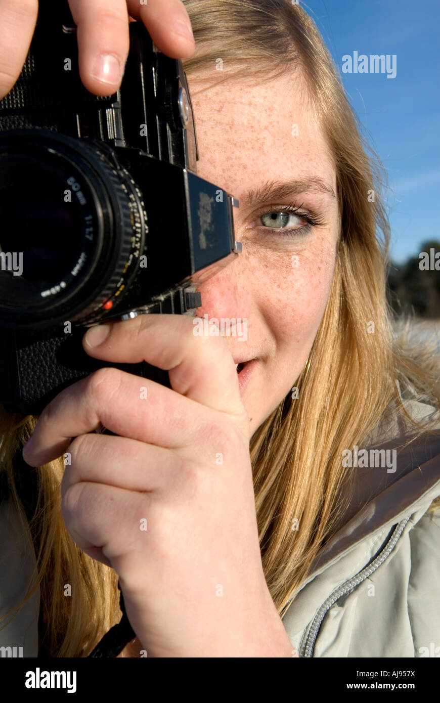 Woman taking pictures Stock Photo - Alamy