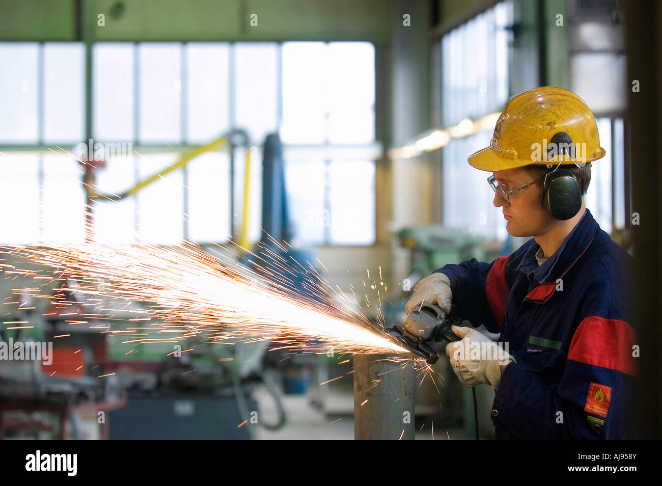 worker in alumininum factory Alcan Iceland Stock Photo - Alamy