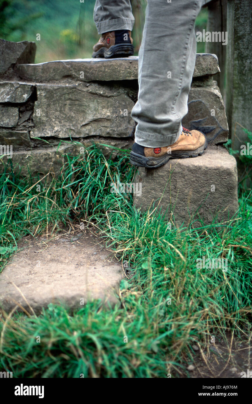 Man walking stone wall hi-res stock photography and images - Alamy