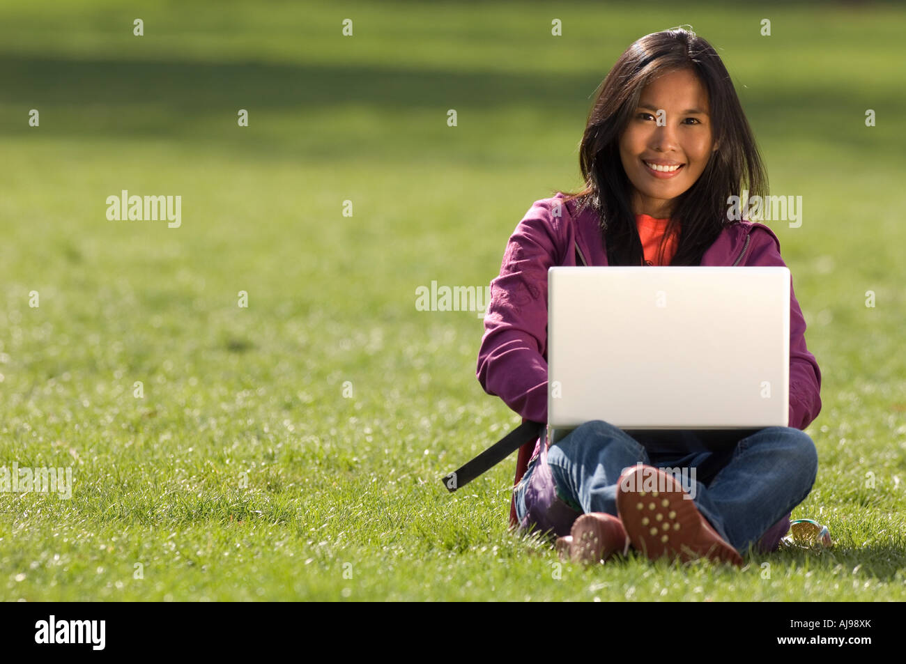 Woman working on computer Stock Photo - Alamy