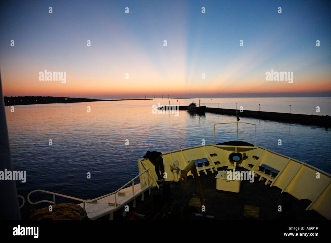 The main Harbour at sunset With Ferry Kamariotissa Port Samothraki ...