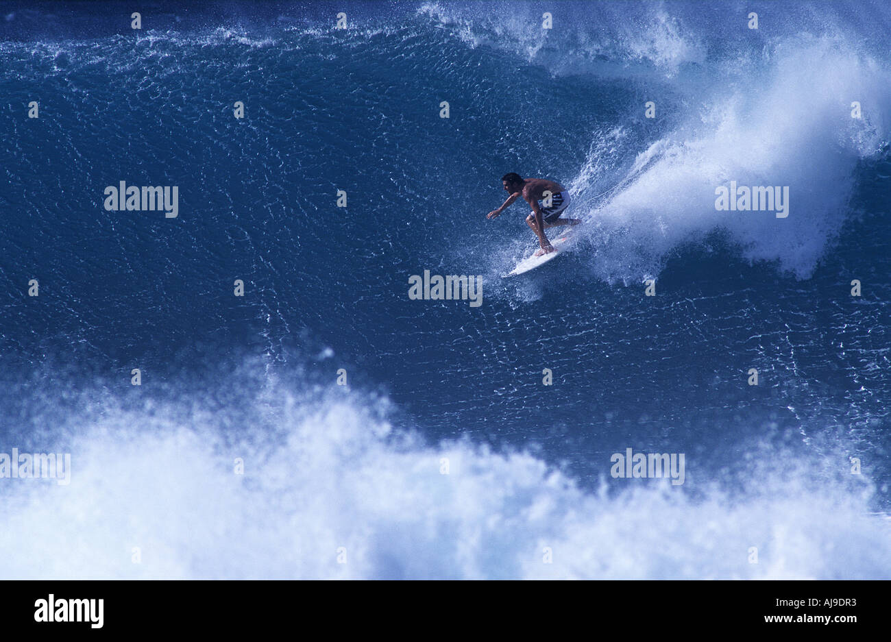 Surfer rides the Pipeline wave on the north shore of Oahu Hawaii Stock ...