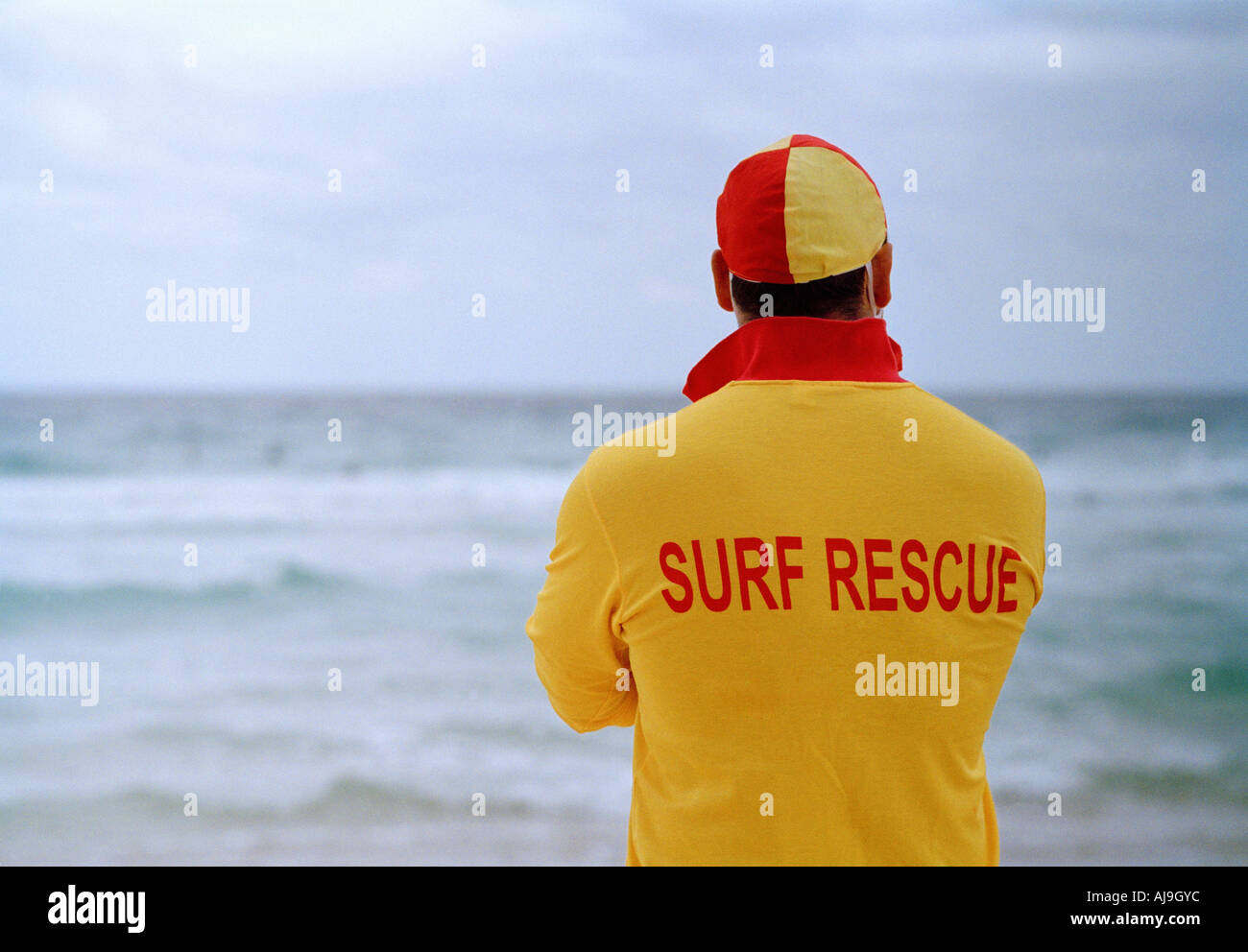 Red and yellow beach uniform hi-res stock photography and images - Alamy