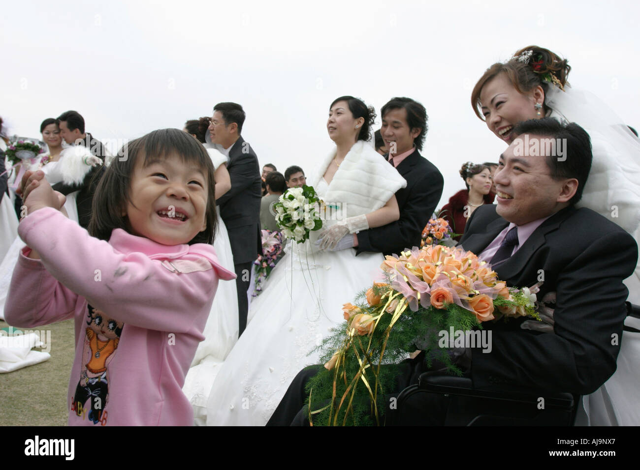 Group wedding in Asia Stock Photo - Alamy