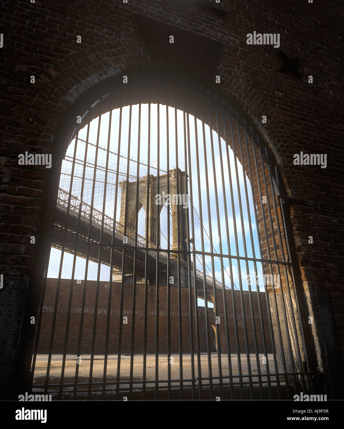 View of Brooklyn Bridge Through Warehouse Gate Stock Photo - Alamy