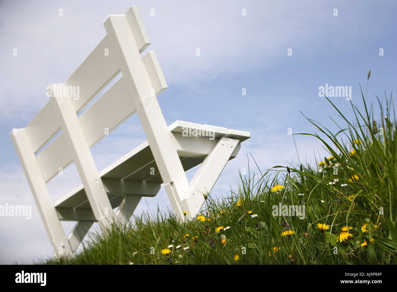 White Bench in Field Stock Photo - Alamy
