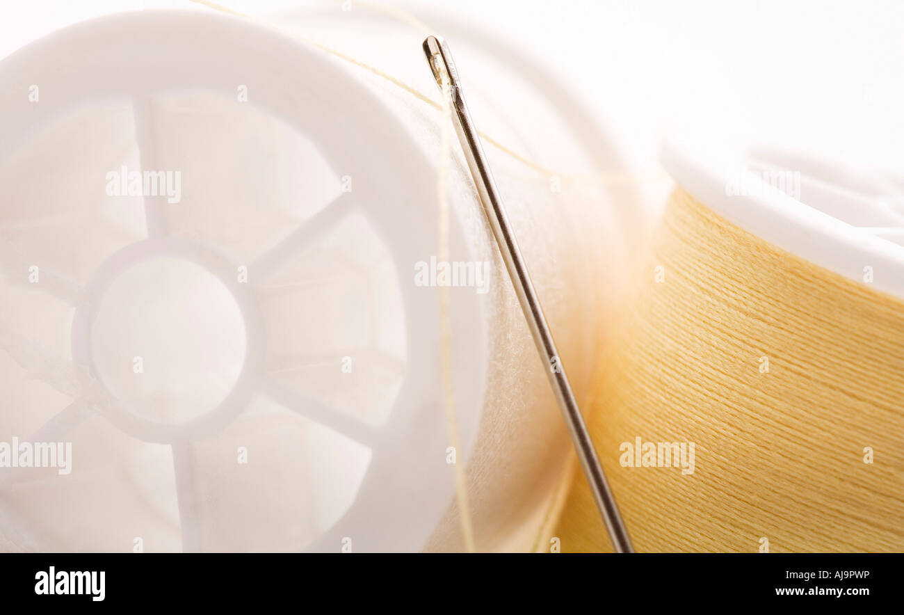 Needle and Thread Stock Photo - Alamy