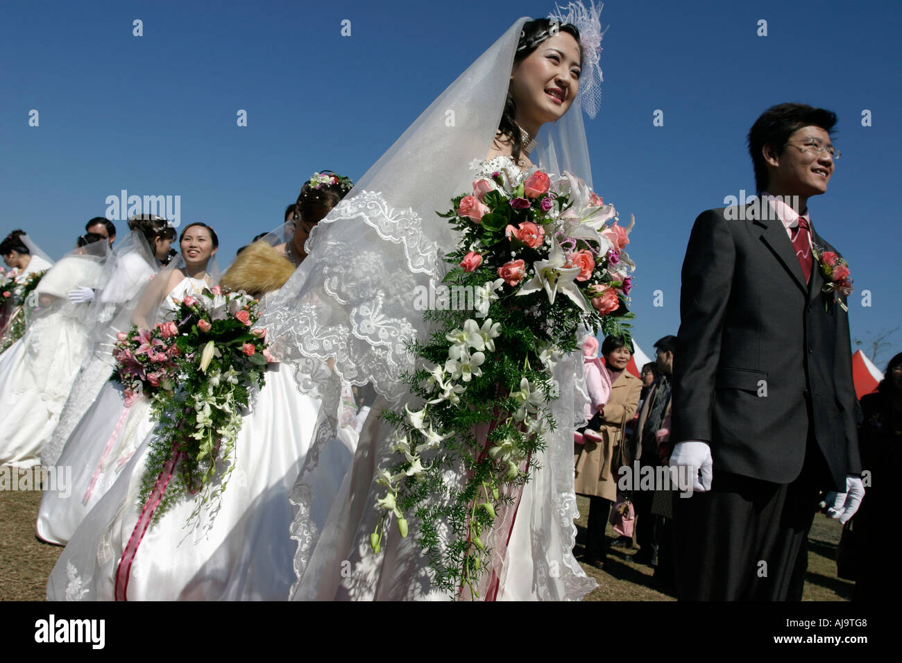 Group wedding in Asia Stock Photo - Alamy
