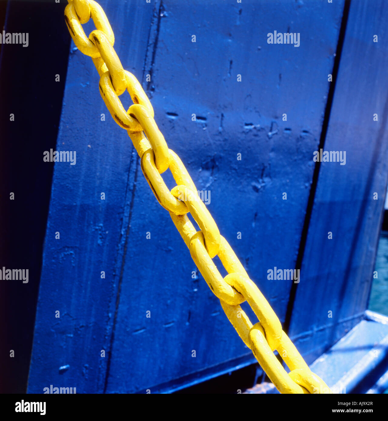 Yellow chain links on Greek ferry Stock Photo - Alamy