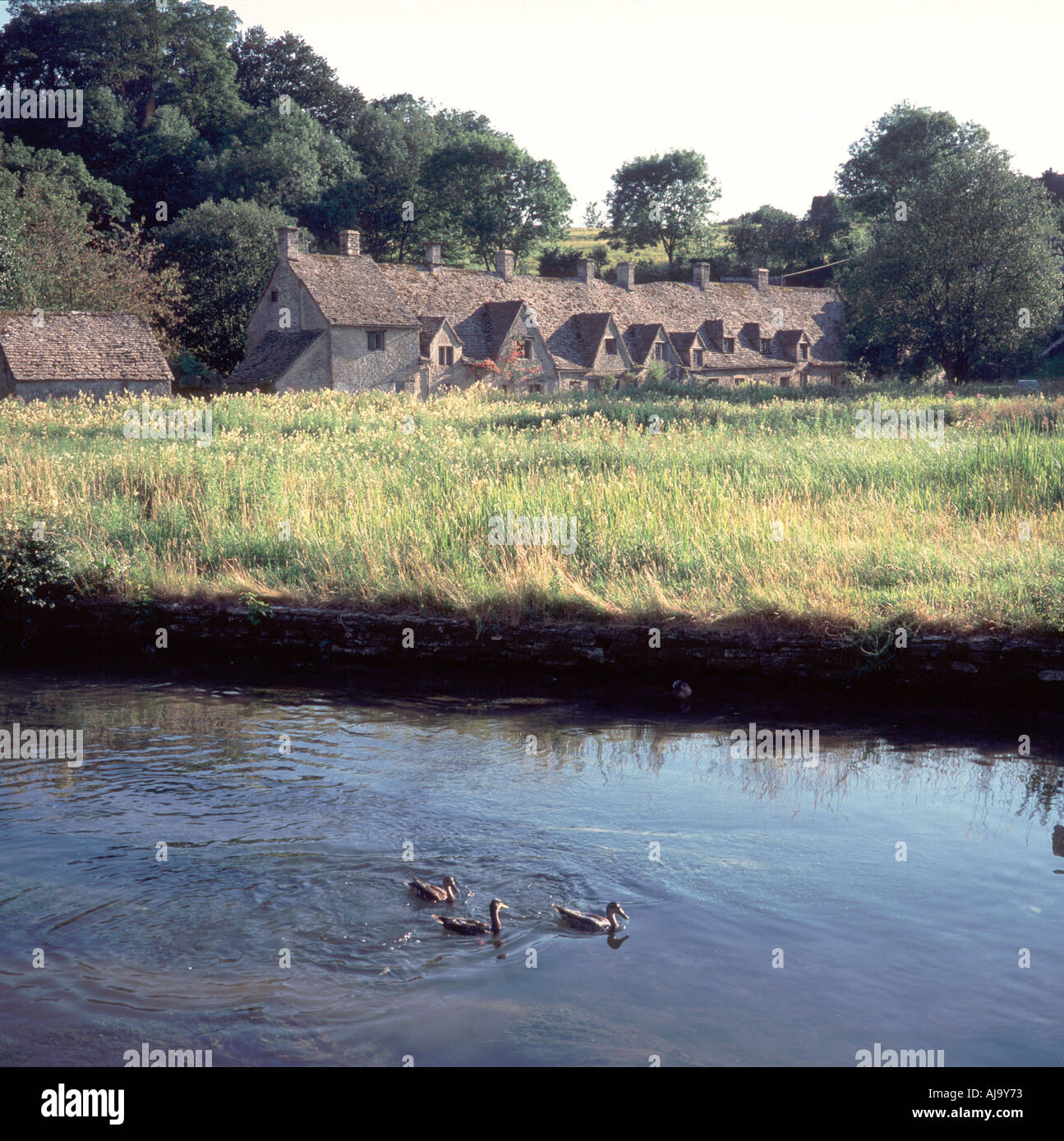 Rack Isle, Former weavers cottages beyond River Coln, Arlington Row ...