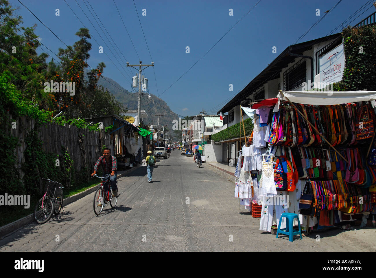 Textile vendor in Panajachel, Guatemala Stock Photo - Alamy