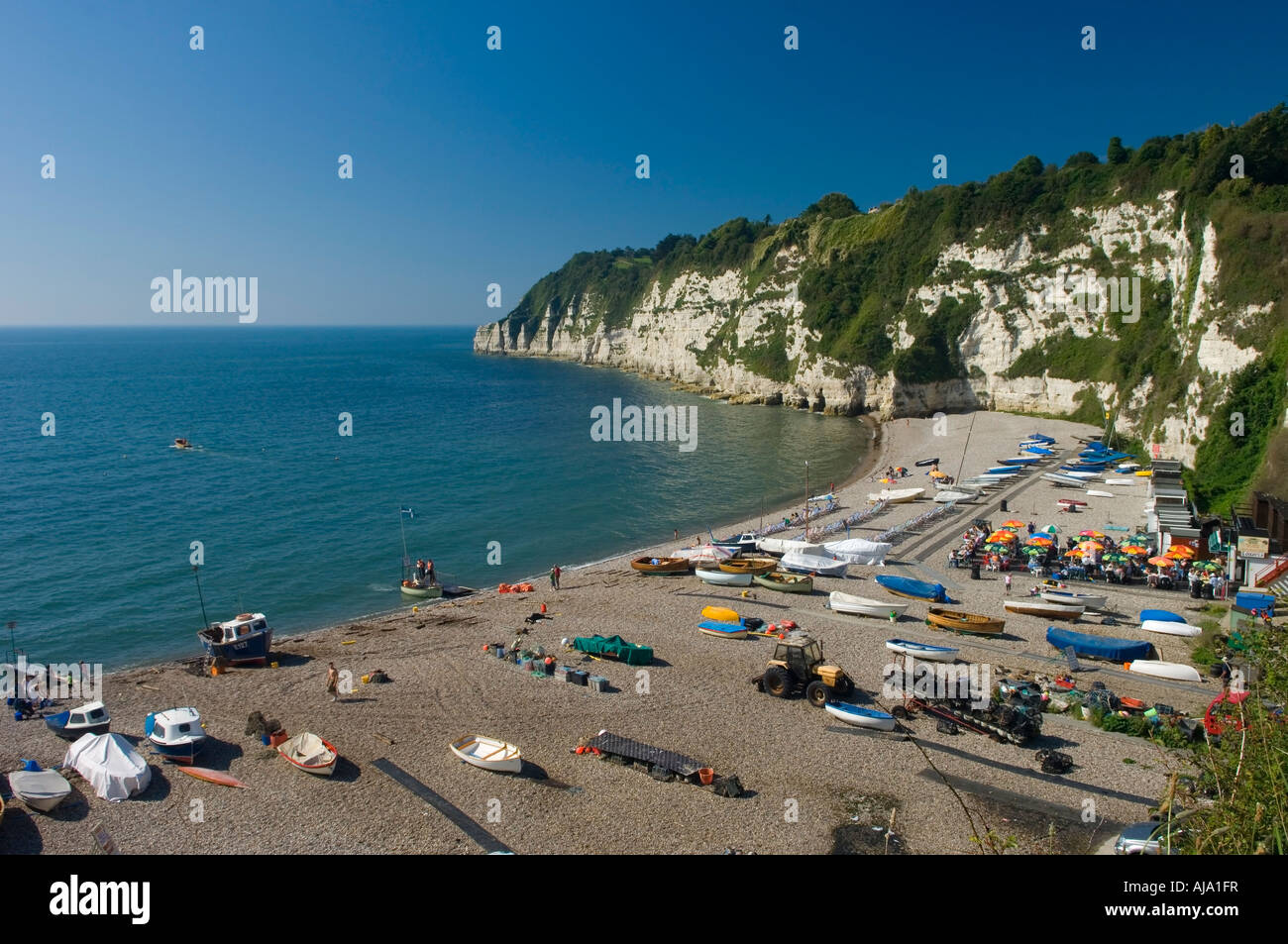 UK England Devon Beer view down hill to boats on beach and cliffs ...