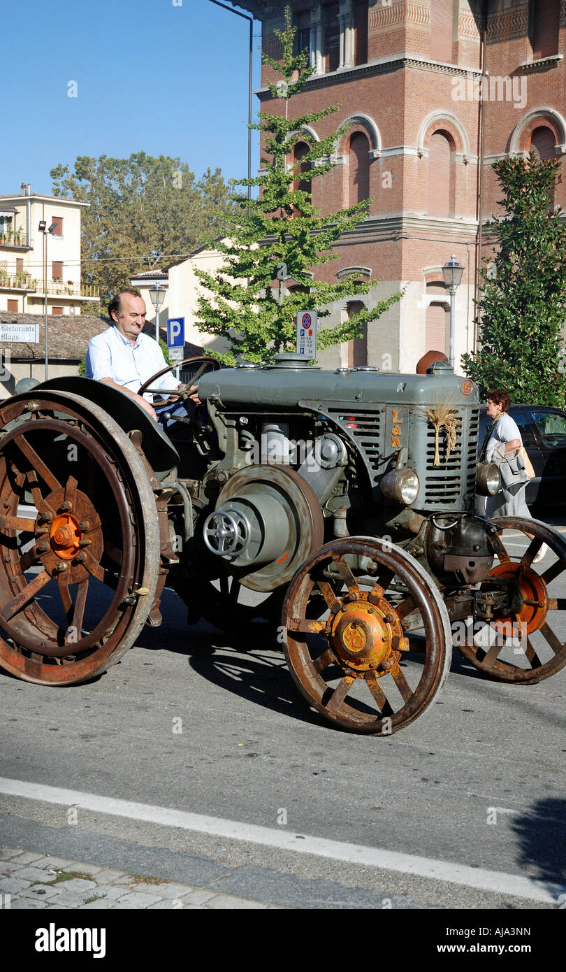 A Landini vintage tractor on parade through town in Italy Stock Photo ...