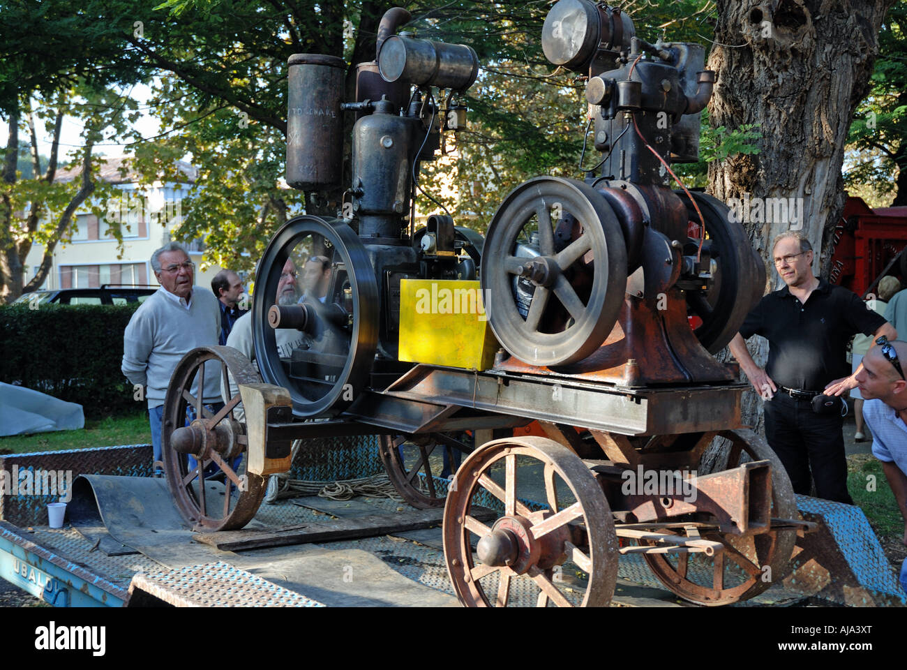 Vintage farm machinery on display at a tractor rally in Italy Stock ...