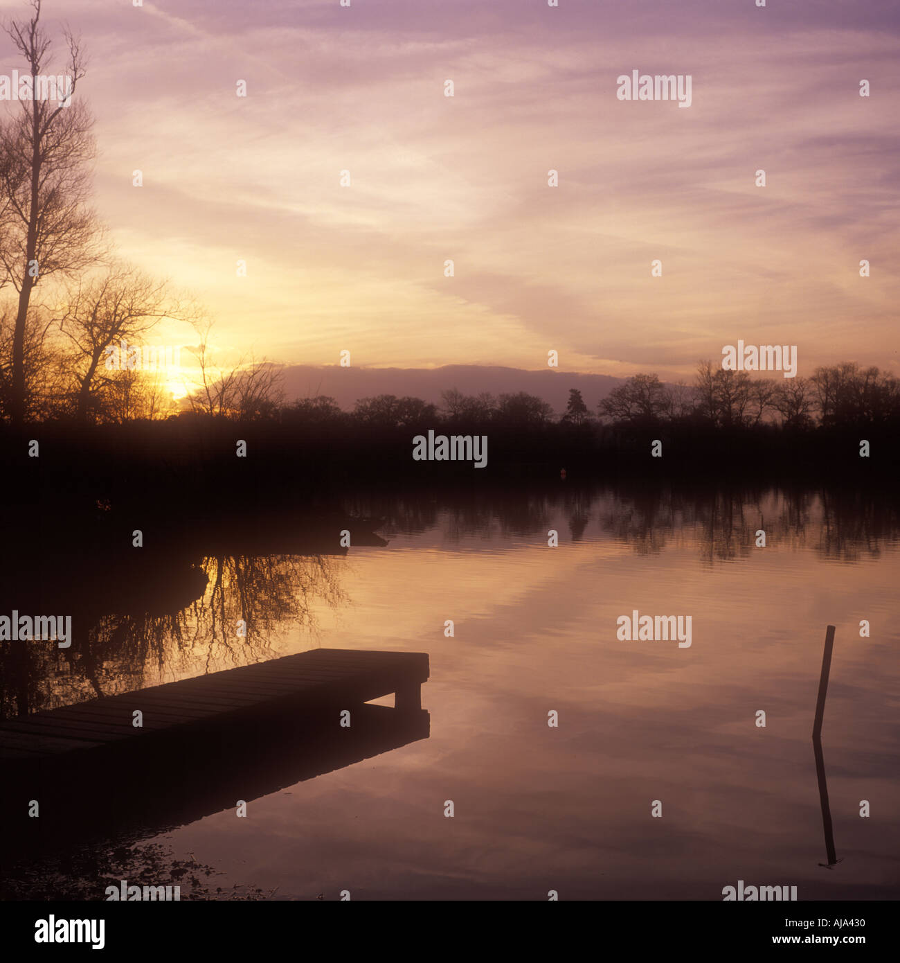 Sunset Across the Lake Stock Photo - Alamy