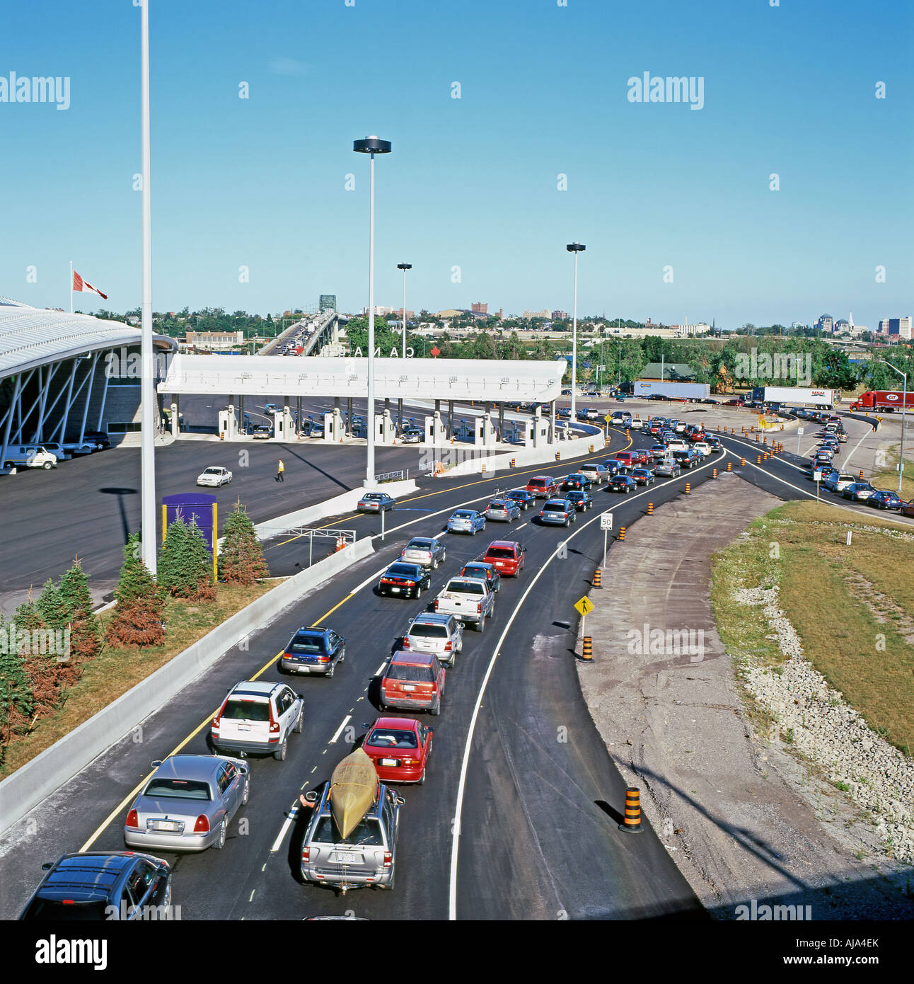 Lines of cars line up queue in traffic leaving Canada to cross Peace ...