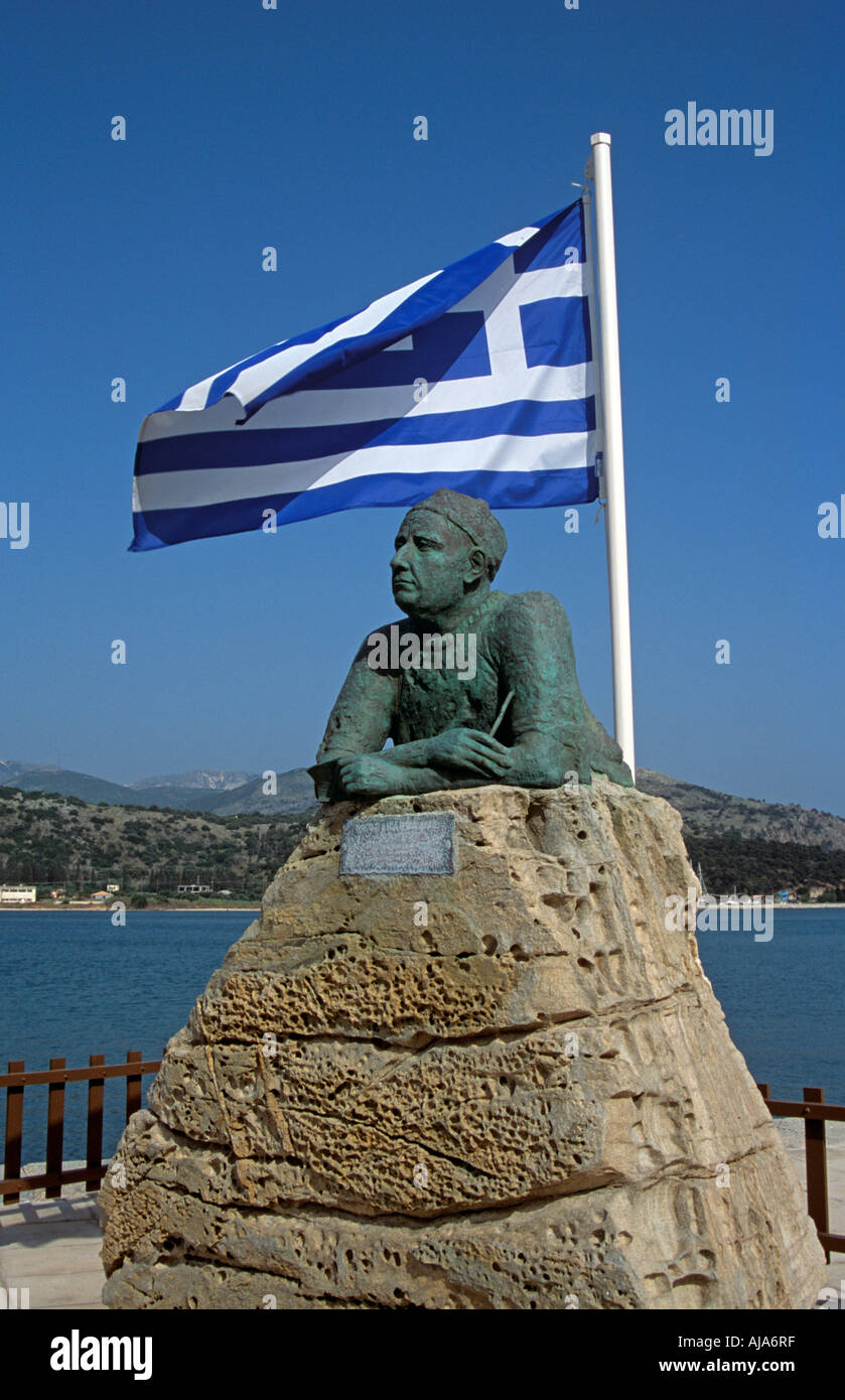 Statue with Greek flag above at entrance to Argostoli Port and Harbour ...