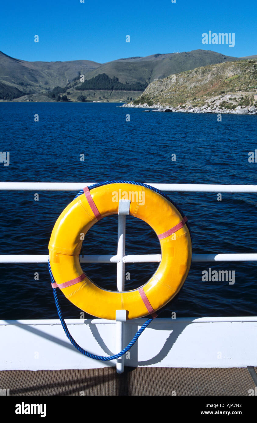 Yellow life belt on deck of ship, Bolivian coastline near Copacabana ...