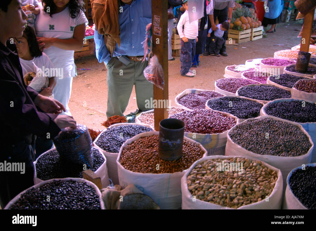 Beans on sale in the market at San Cristobal Stock Photo - Alamy