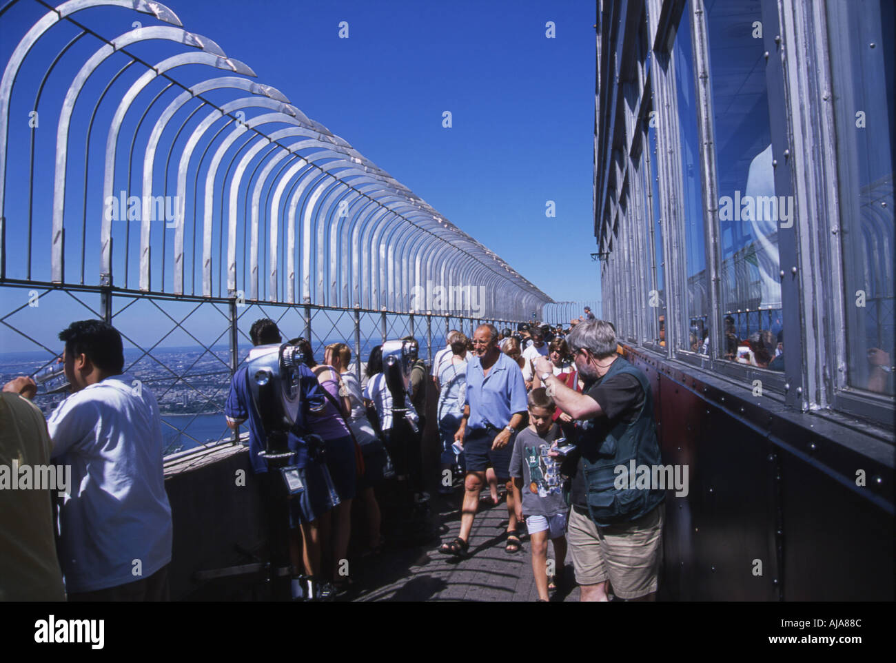 Crowd crowds railing fence hi-res stock photography and images - Alamy