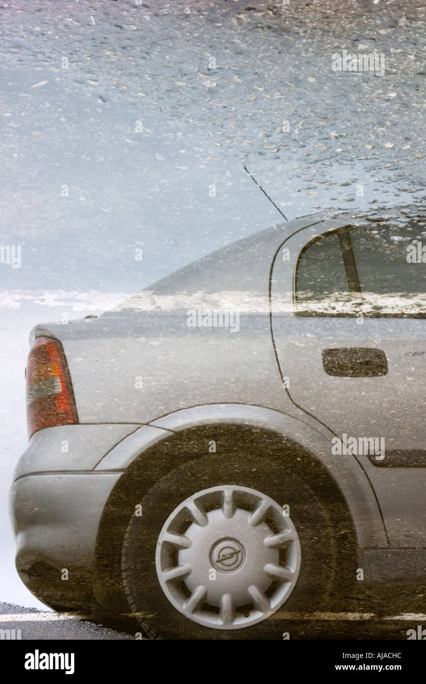 car reflection on the road Stock Photo - Alamy