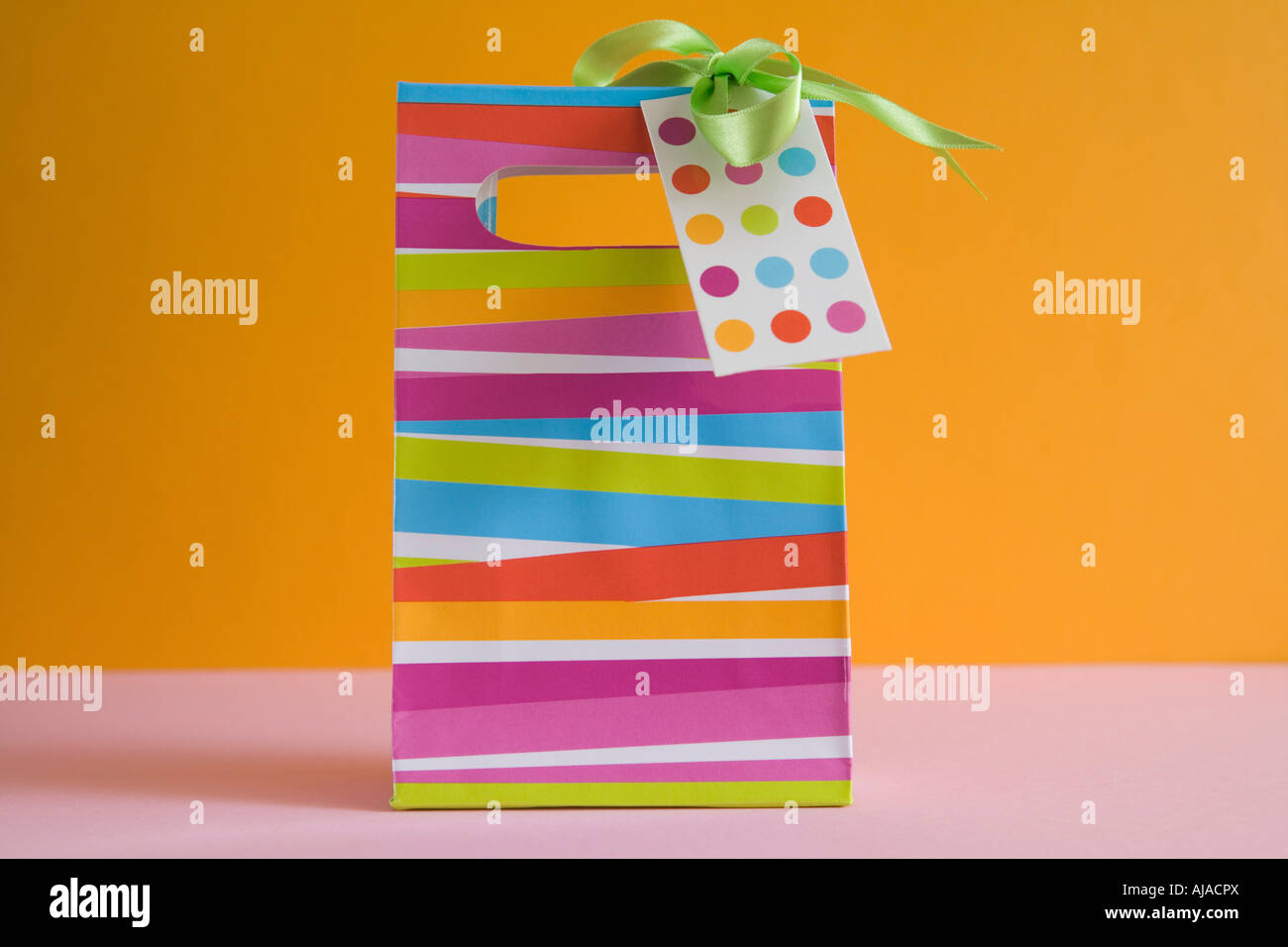 Multi coloured gift bag hi-res stock photography and images - Alamy