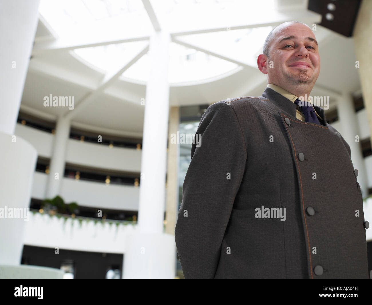 Caucasian security guard standing door hi-res stock photography and ...