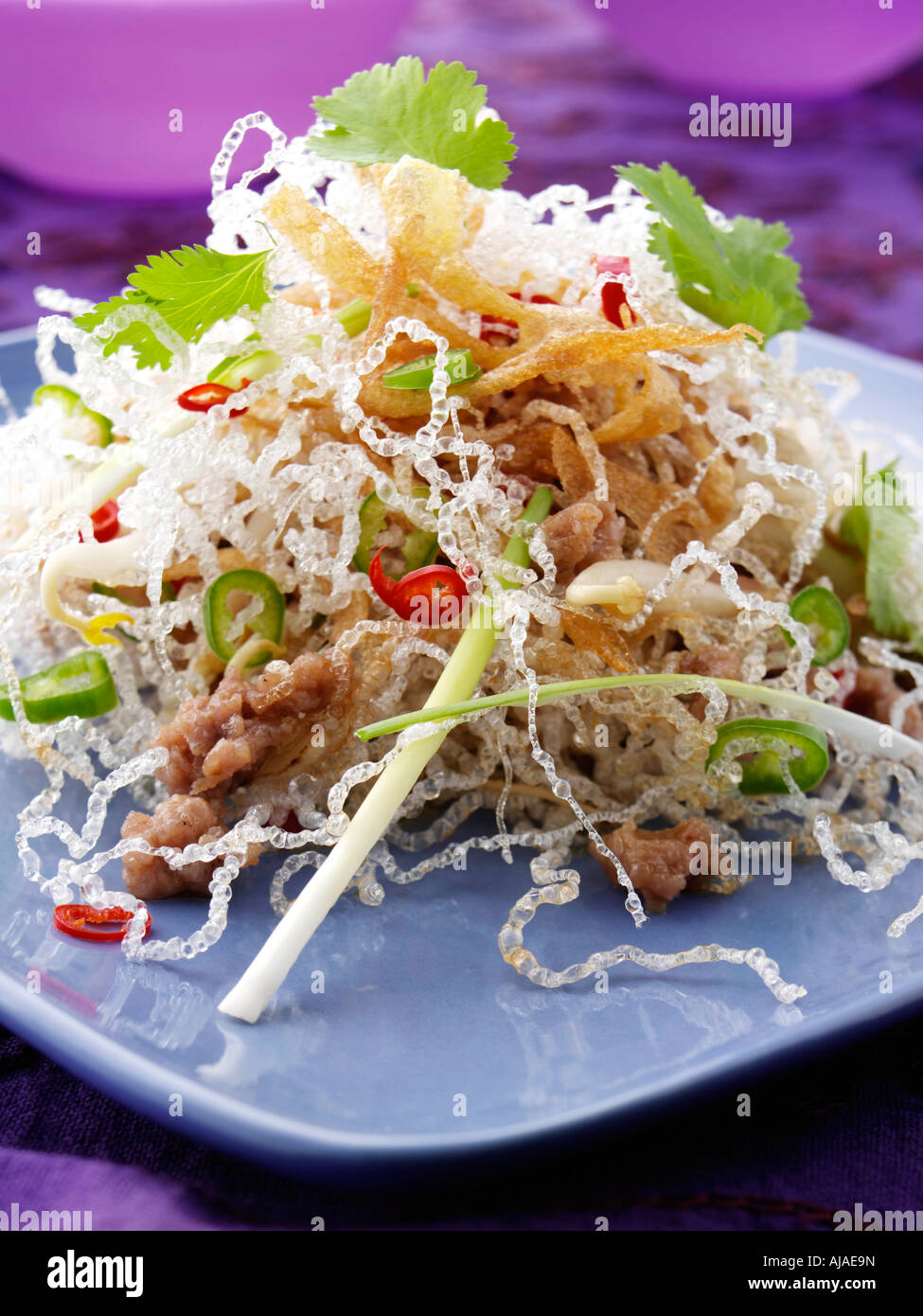 A plate of Thai Mee Krob Vermicelli noodles with sweet and sour sauce ...