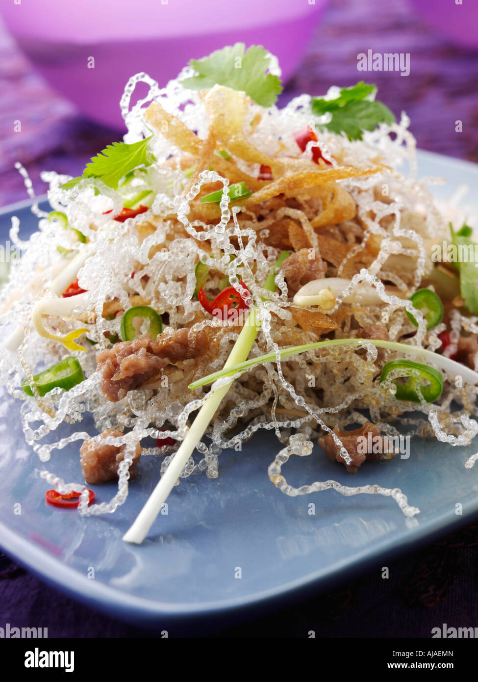 A plate of Thai Mee Krob Vermicelli noodles with sweet and sour sauce ...