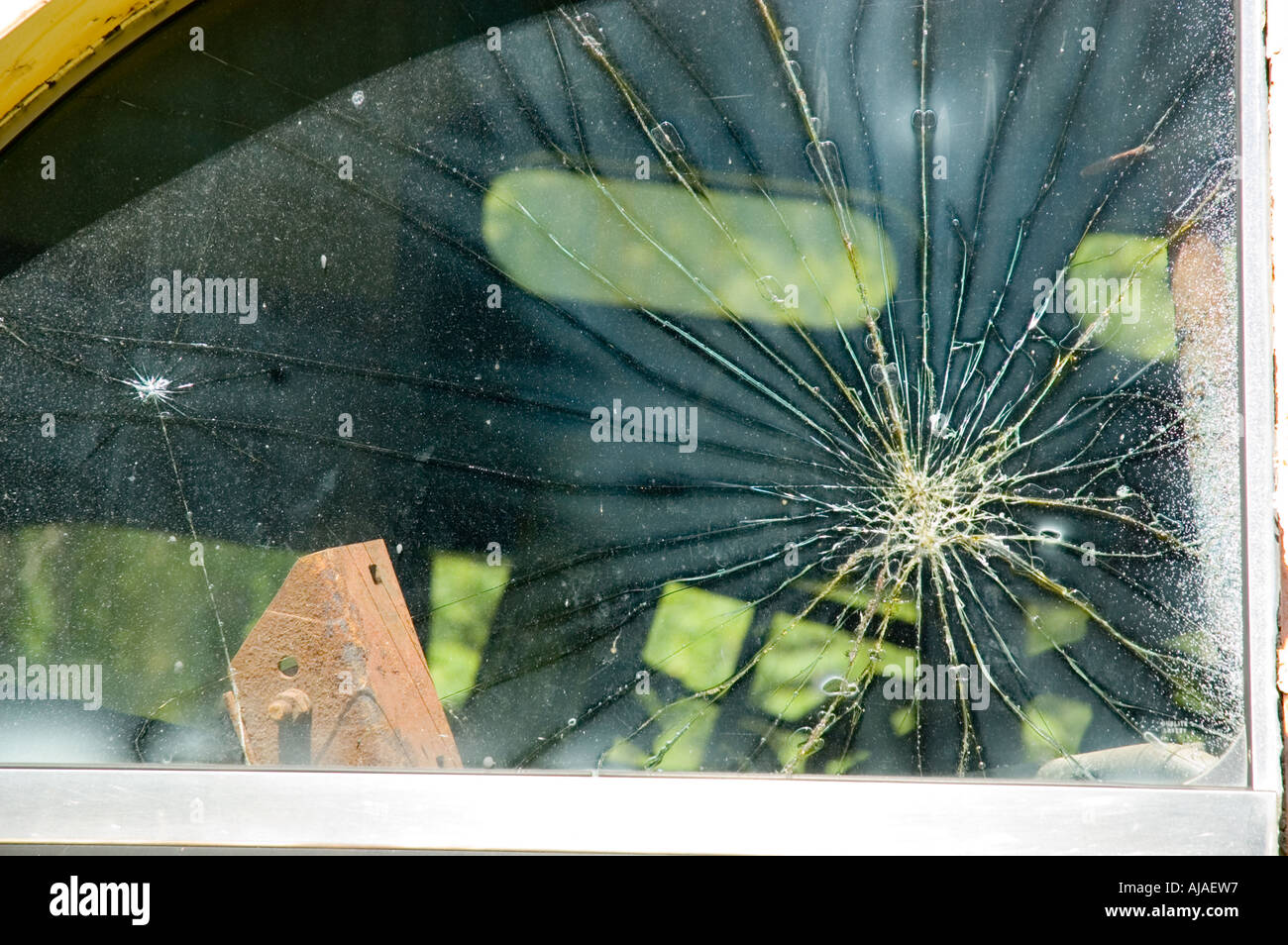 Smashed window glass Stock Photo - Alamy