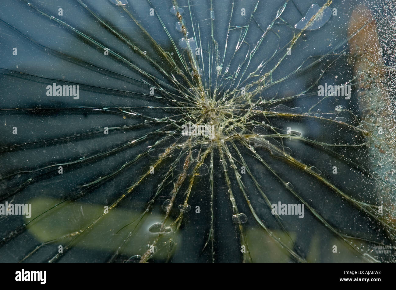 Smashed window glass Stock Photo - Alamy