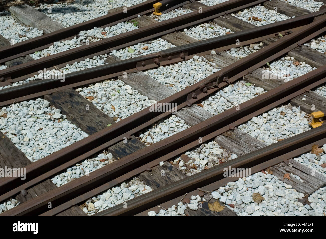 Crossing point of railway tracks in a rail yard Stock Photo - Alamy