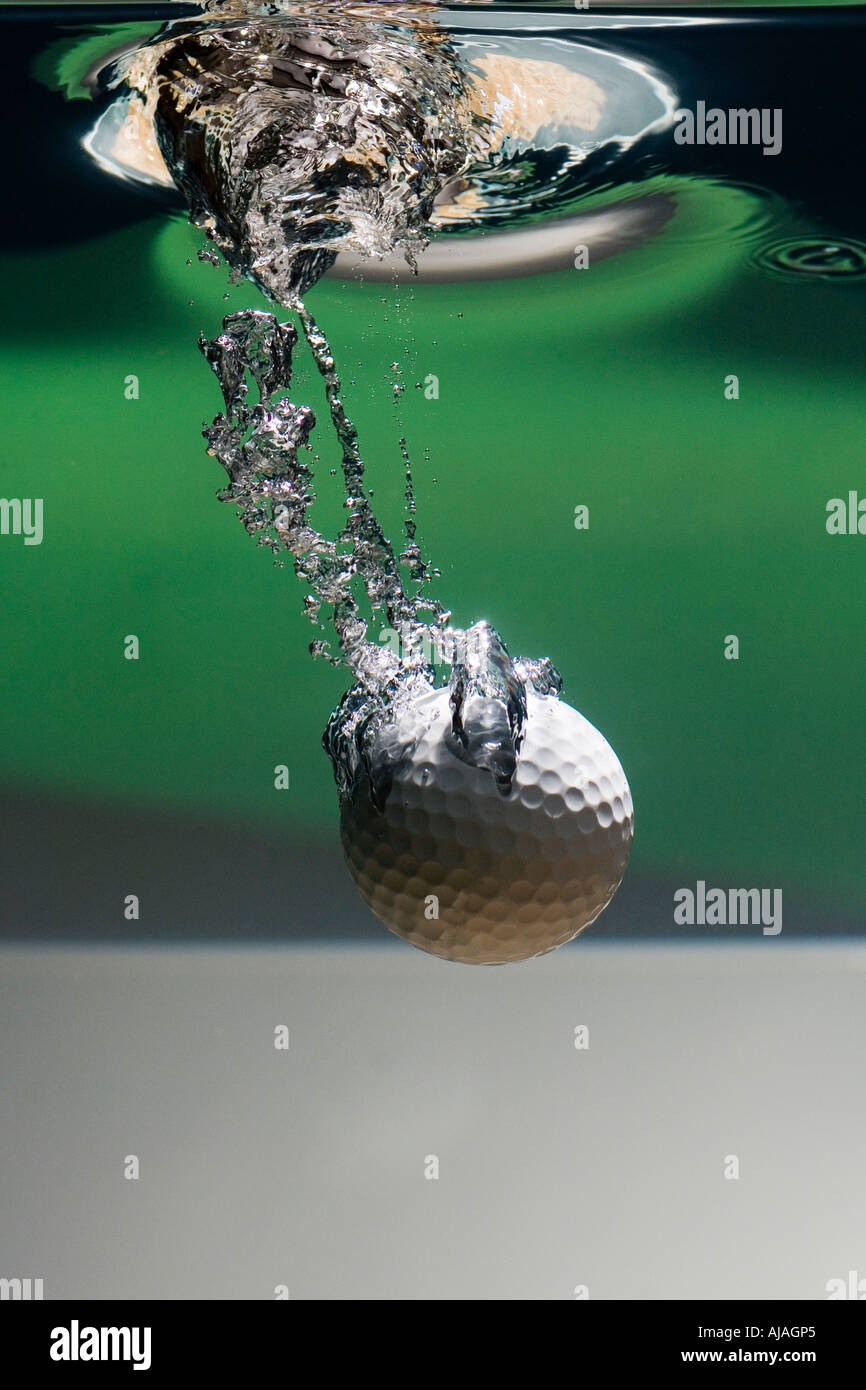 golf ball falling into water Stock Photo - Alamy