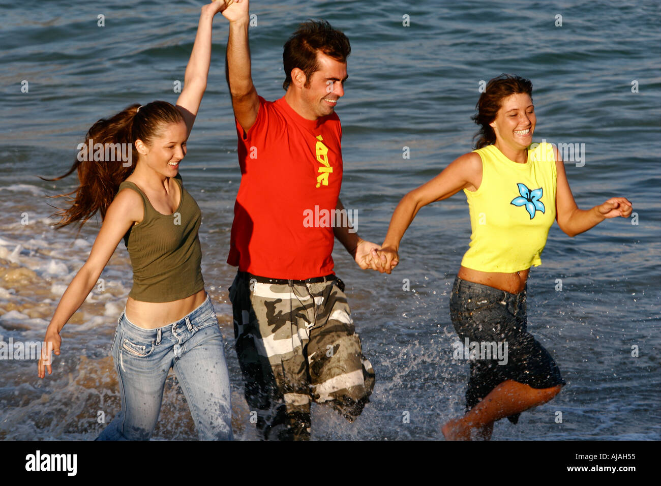 colorful friends at the beach Stock Photo - Alamy