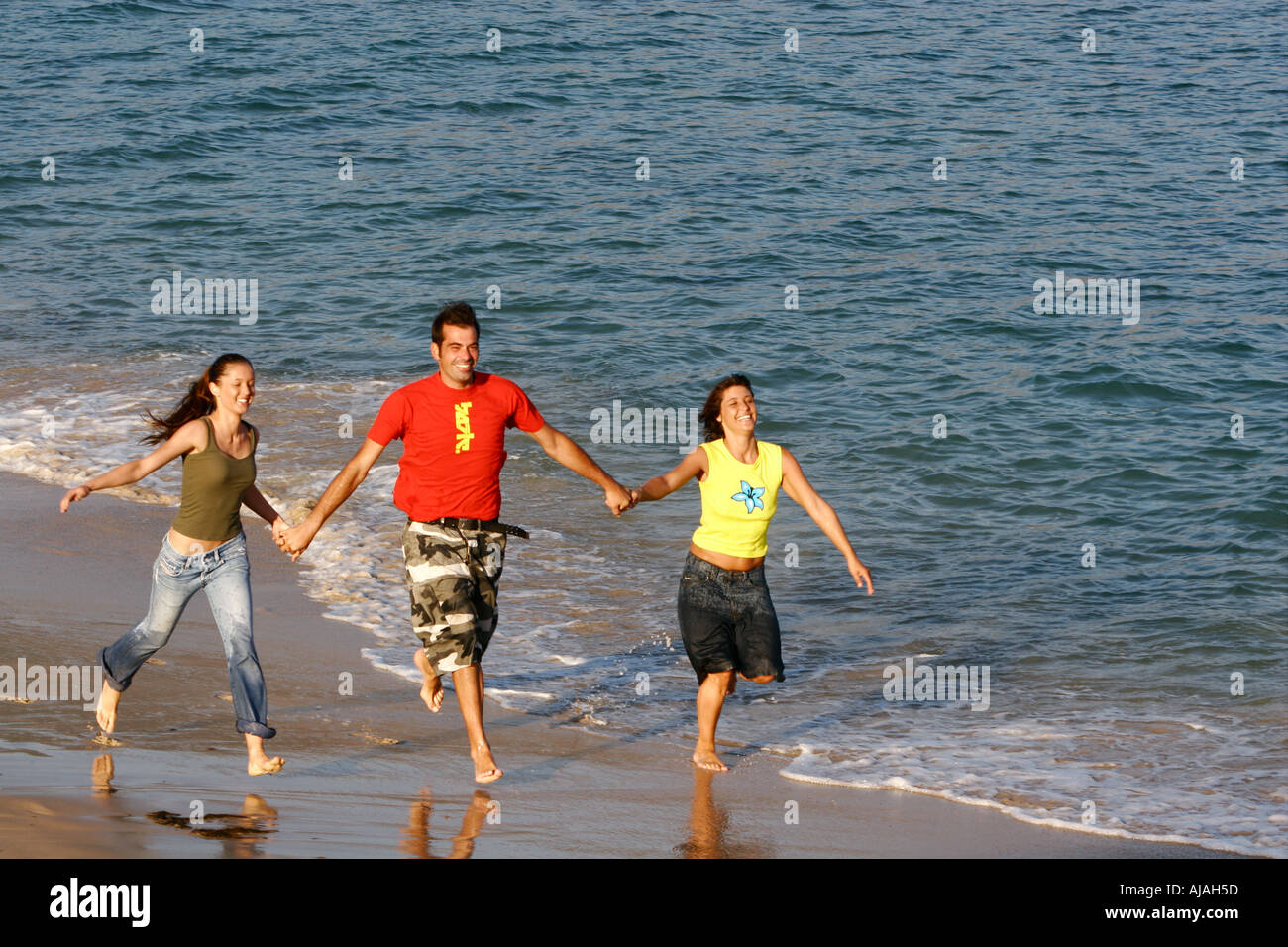 colorful friends at the beach Stock Photo - Alamy