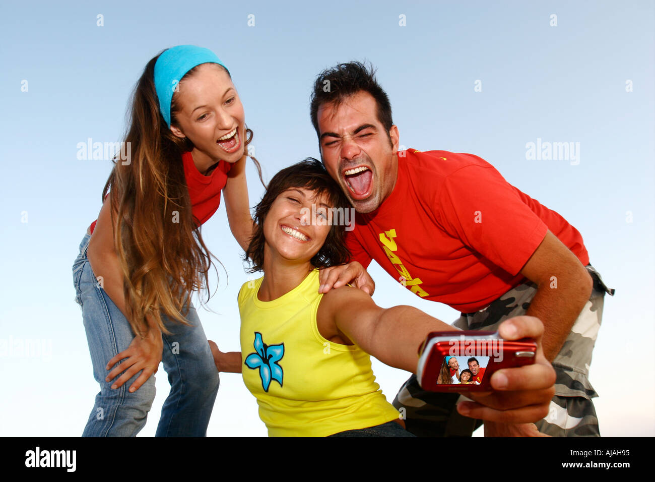 Group of friends in colourful clothes Fun group of friends in colourful ...