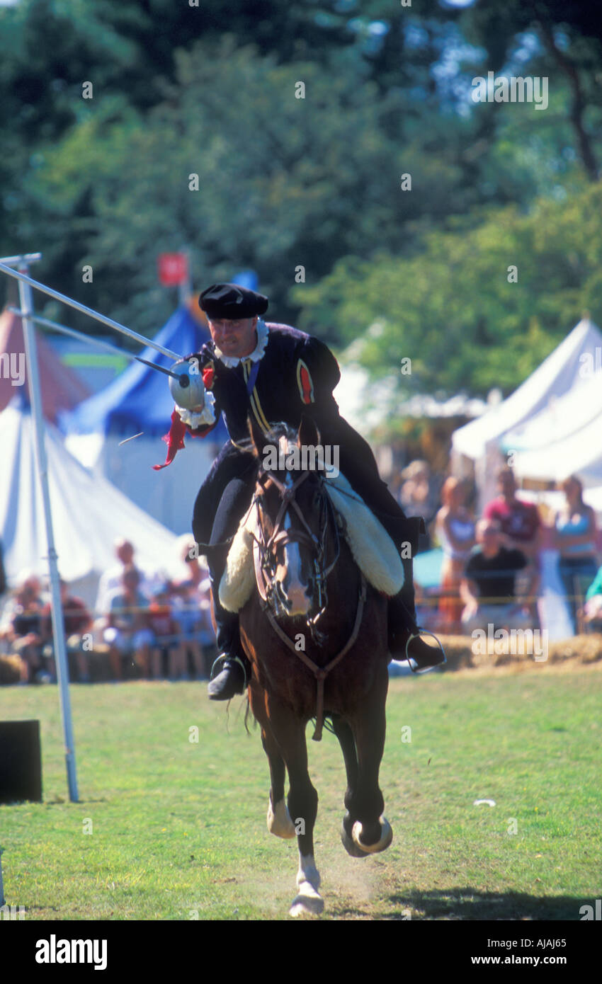 Horse riding during the skills at arms event including lancing rings ...
