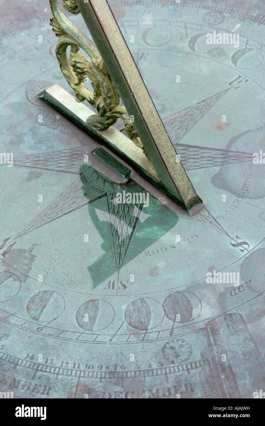 Sundial reflected in the rain Stock Photo - Alamy