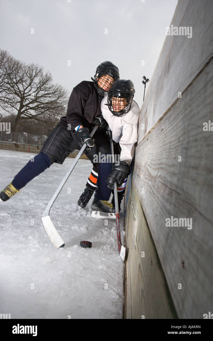 Two boys hockey uniform hi-res stock photography and images - Alamy