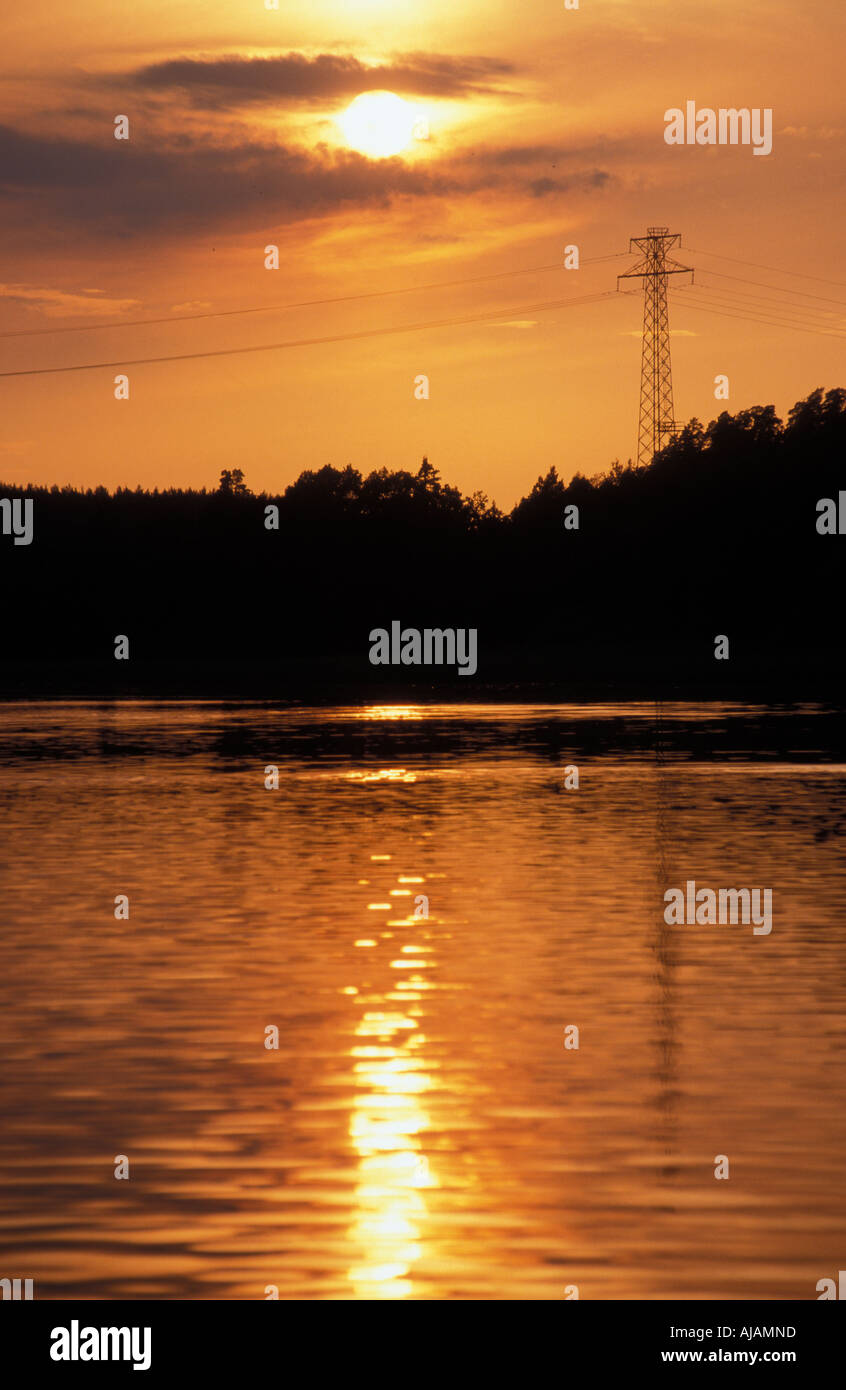 High voltage overhead power lines crossing a lake in central Sweden ...