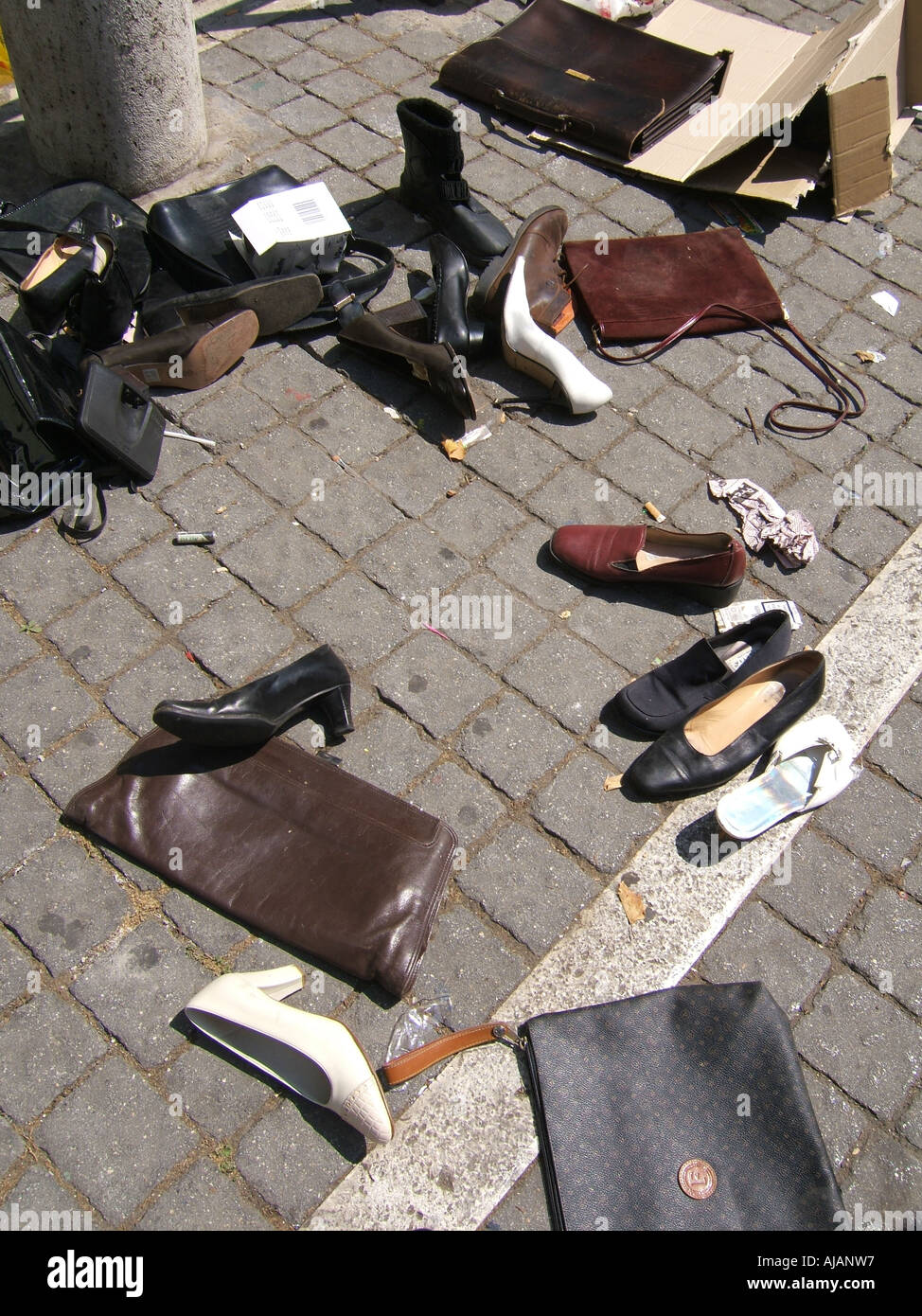 Discarded shoes on street hi-res stock photography and images - Alamy