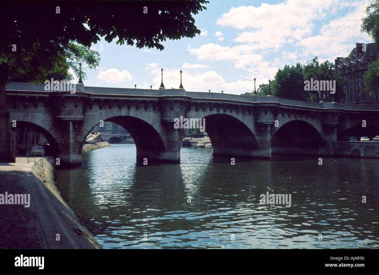 Pont neuf bridge crossing the Seine in Paris France Stock Photo - Alamy