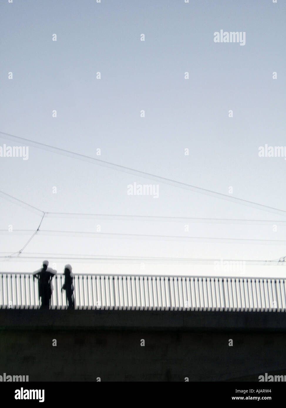 people crossing bridge at night Stock Photo - Alamy