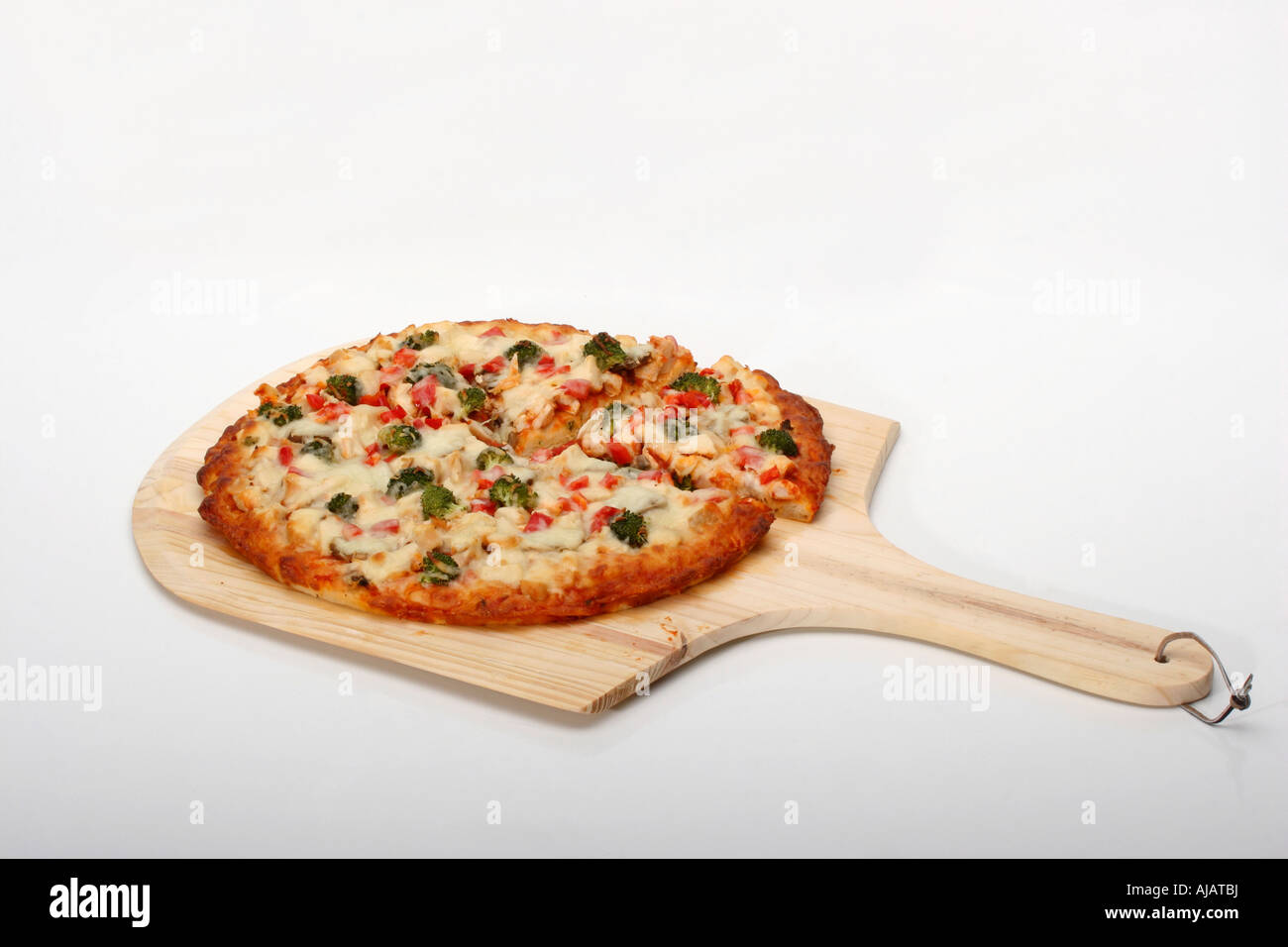 Whole pizza on a wooden board with vegetable and cheese fresh fast food ...