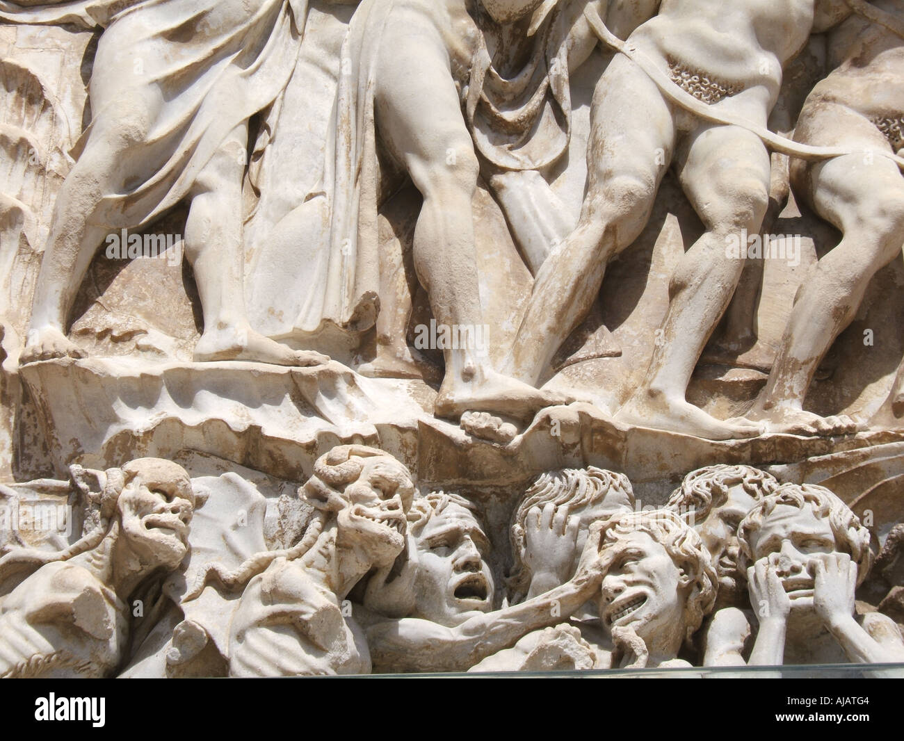 sculpture of hell on orvieto cathedral facade, italy Stock Photo - Alamy