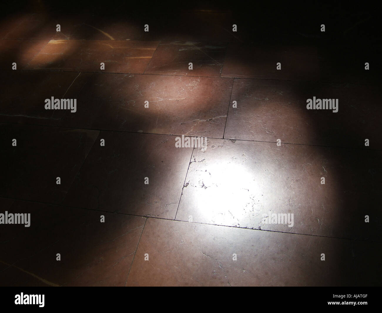 light beam on old tiled floor Stock Photo - Alamy