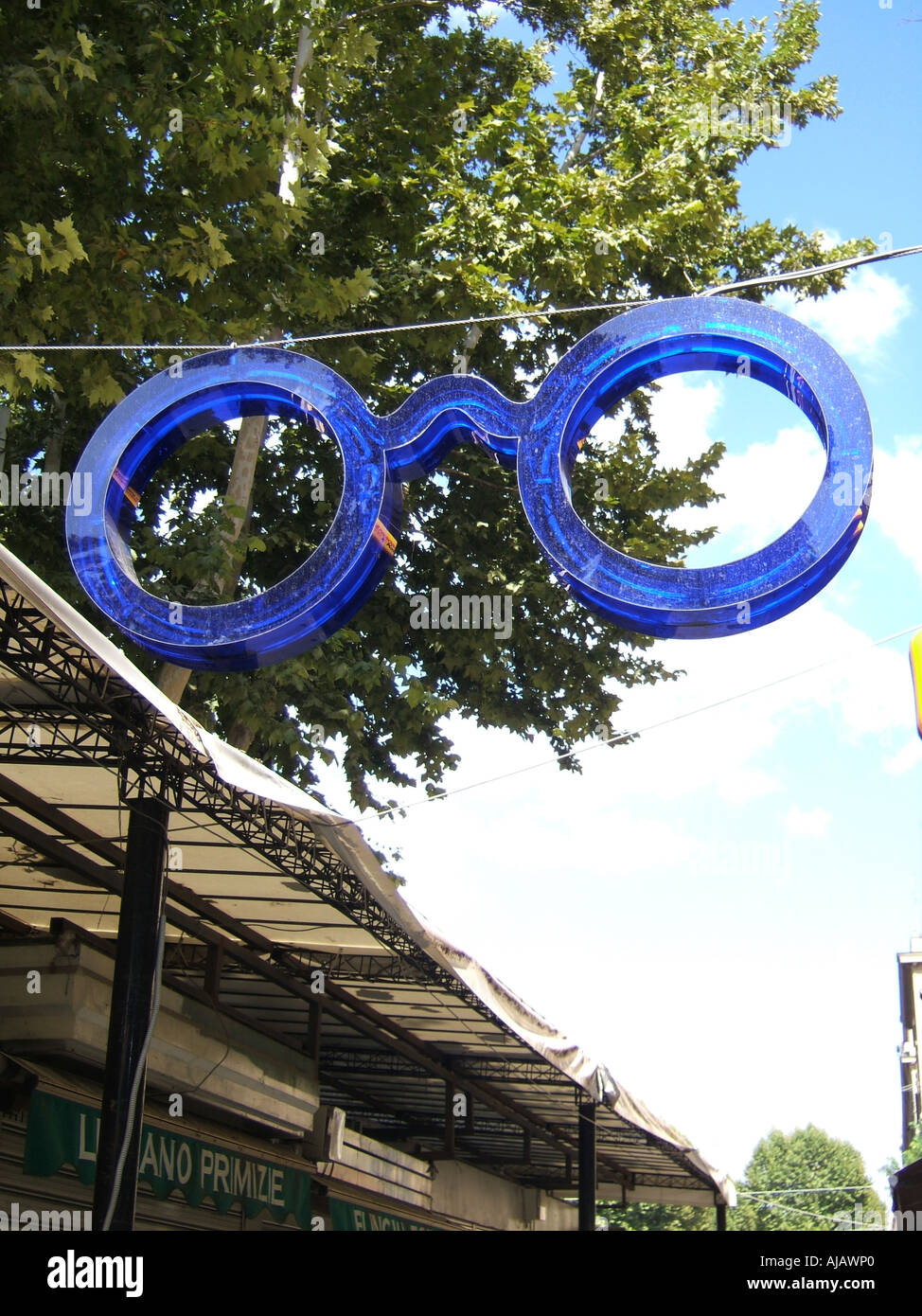 blue neon spectacles sign Stock Photo - Alamy