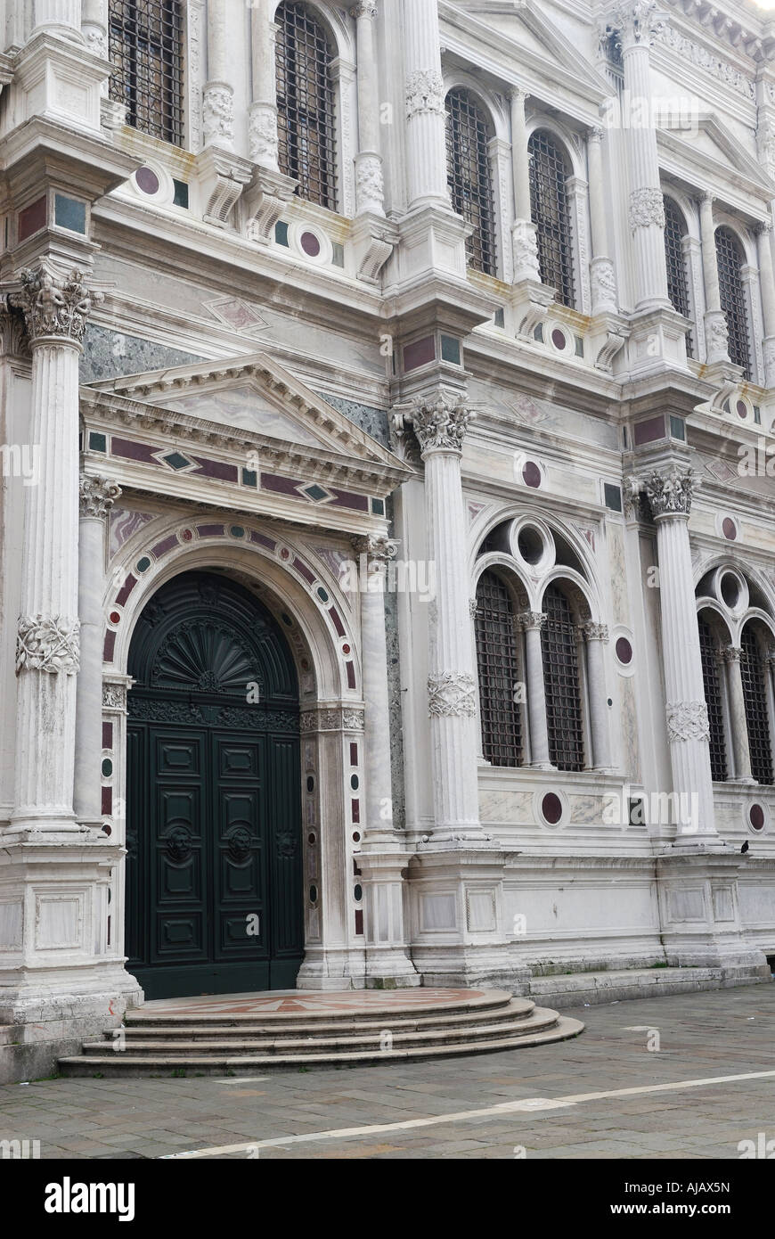 Front door and white marble facade of San Rocco in Venice Stock Photo ...